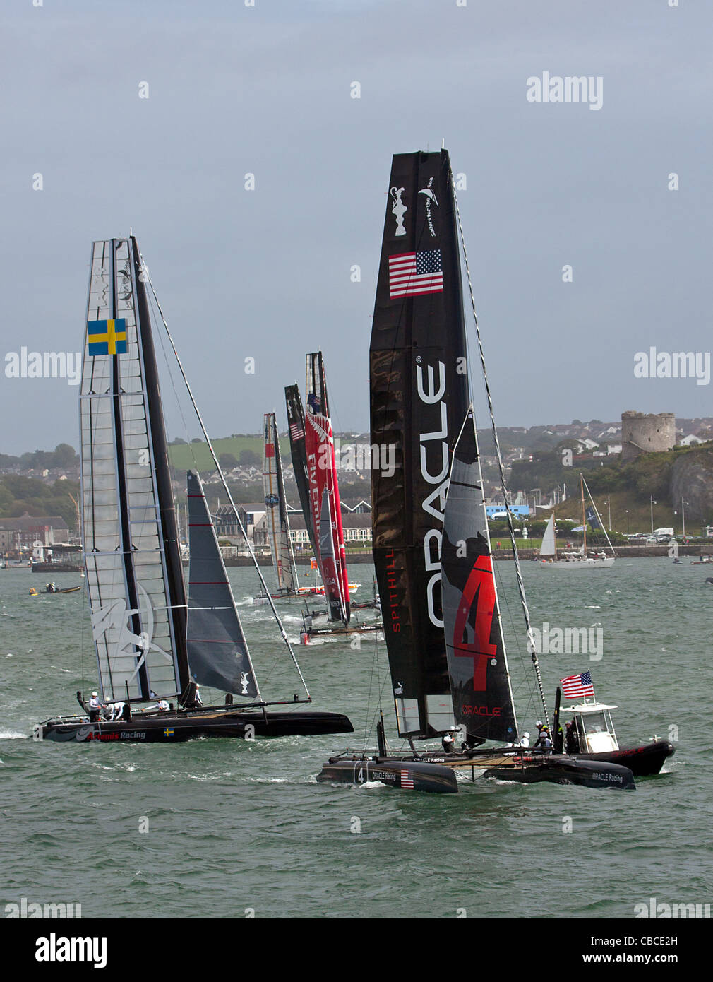 America's Cup catamarans racing off Plymouth, UK Stock Photo - Alamy