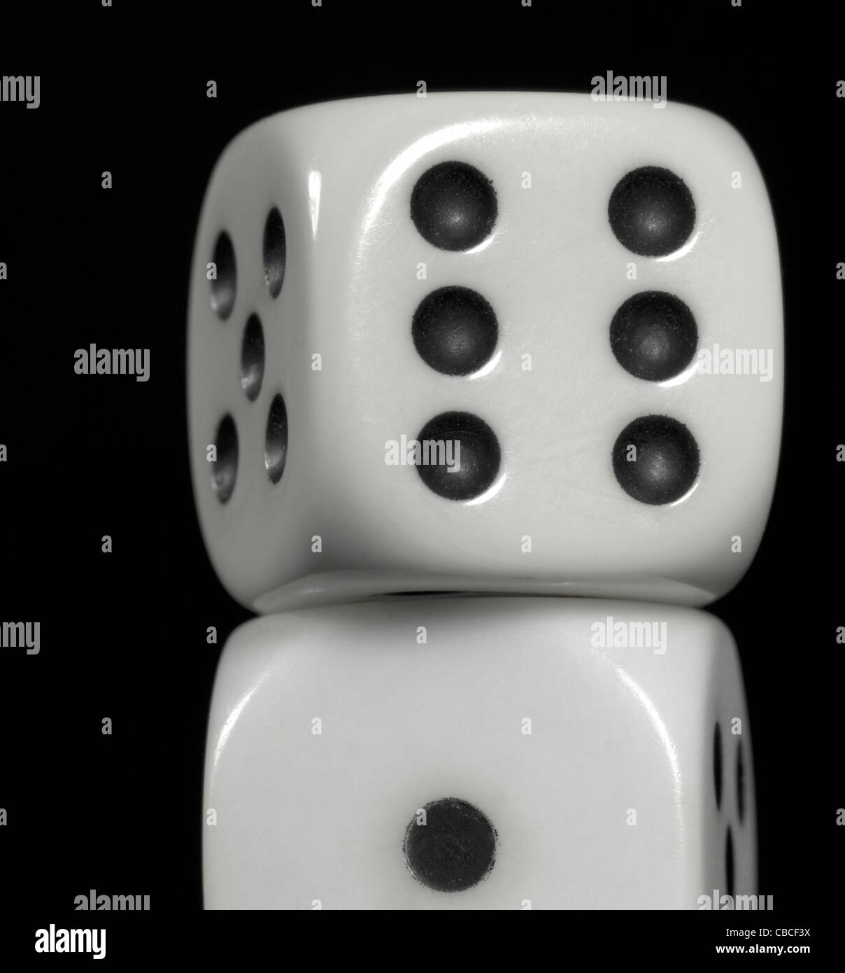 symbolic gambling picture with dice closeup in dark back Stock Photo ...