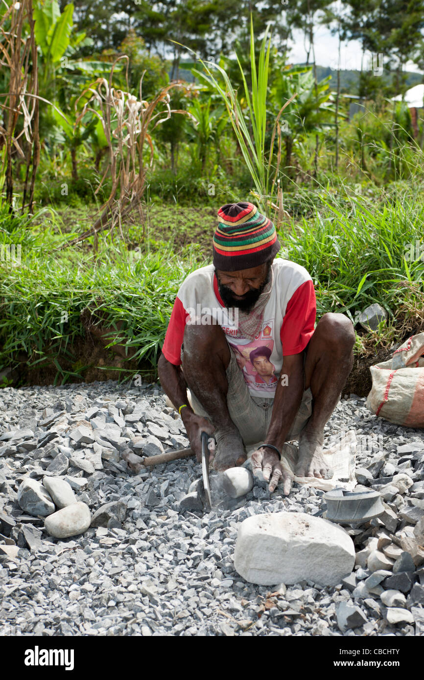 Breaking stones hi-res stock photography and images - Alamy