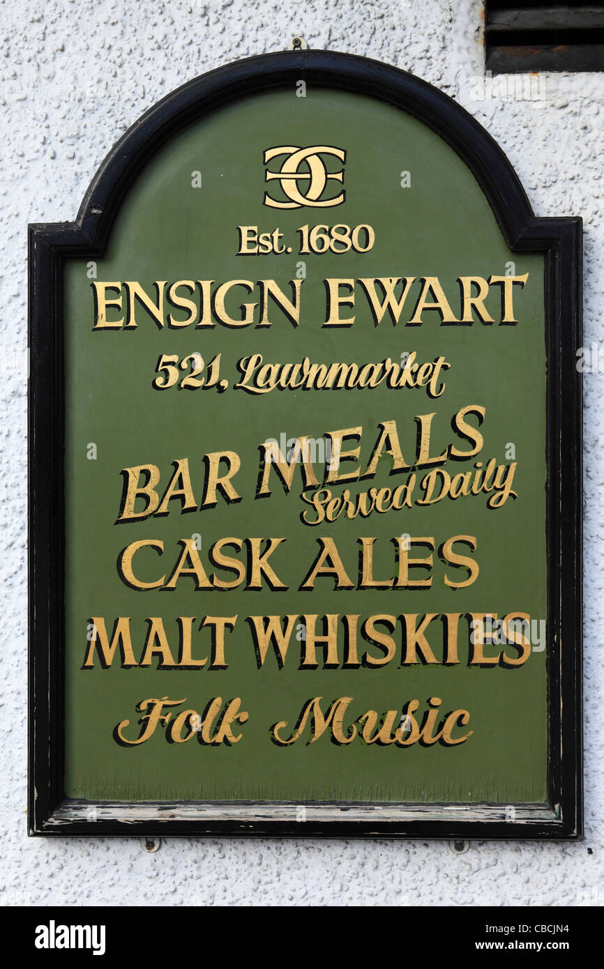A sign for a traditional Scottish pub advertises bar meals, cask ales ...
