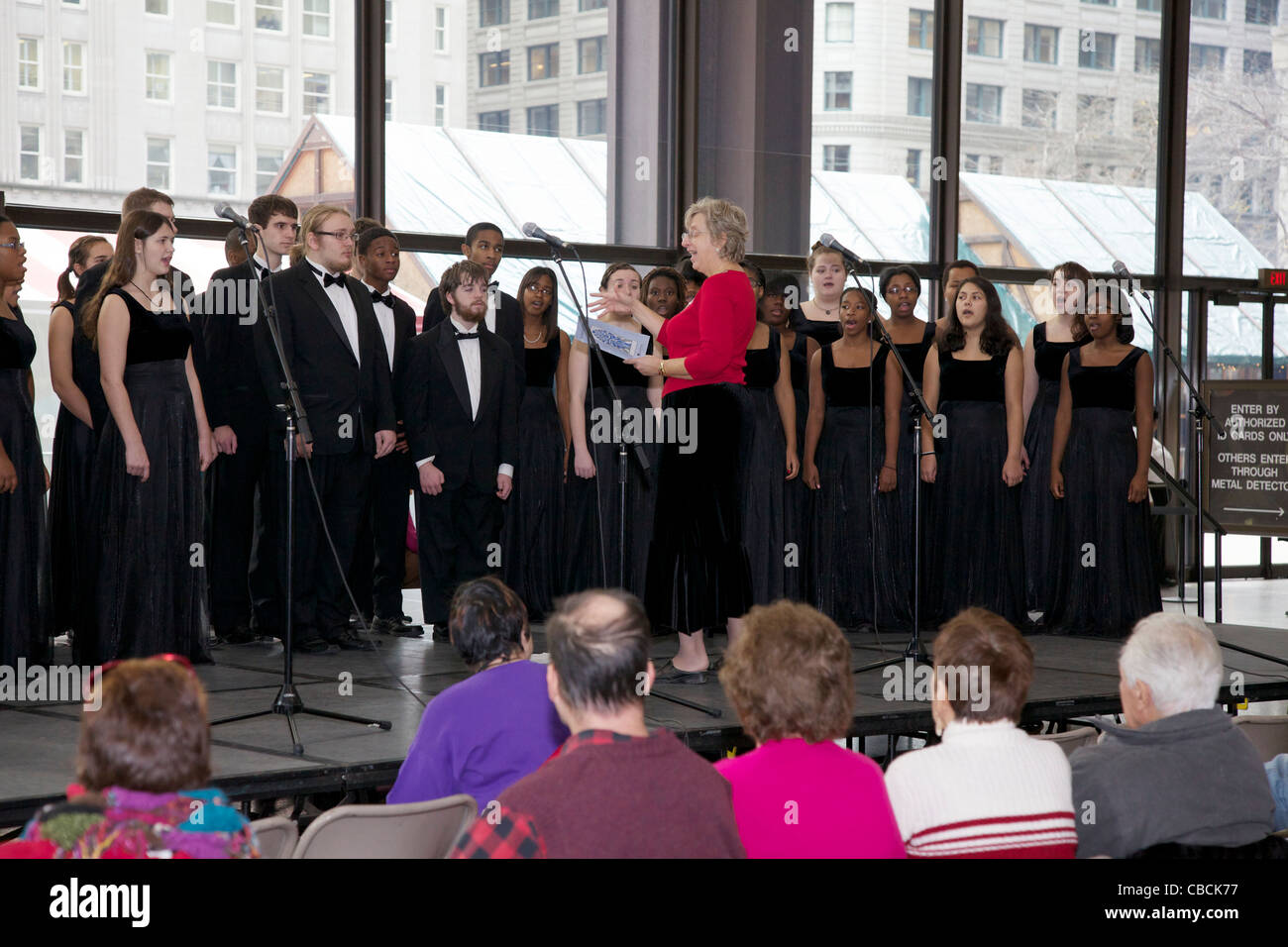 Choir performing inside the Daley Center during Christmas season ...