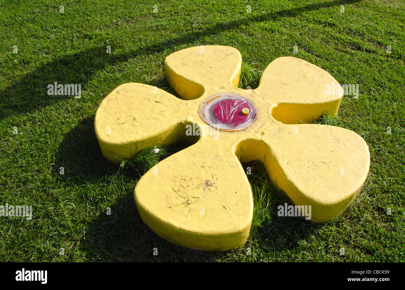 flower form object in the park on grass Stock Photo - Alamy