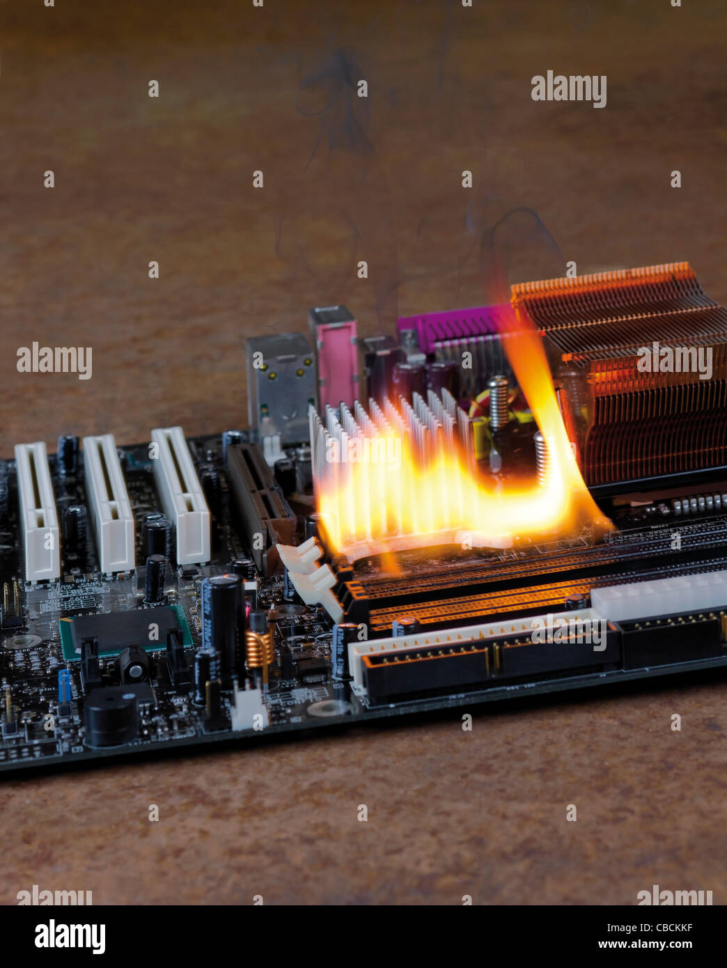 detail of a burning main board located in rusty ambiance Stock Photo ...