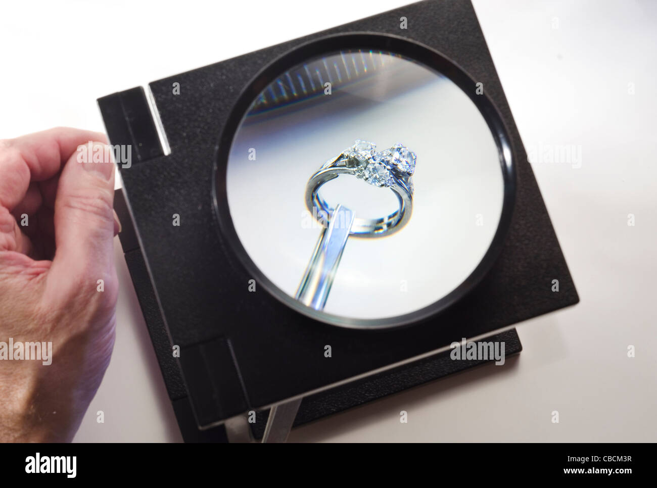 Diamond magnifying glass hi-res stock photography and images - Alamy