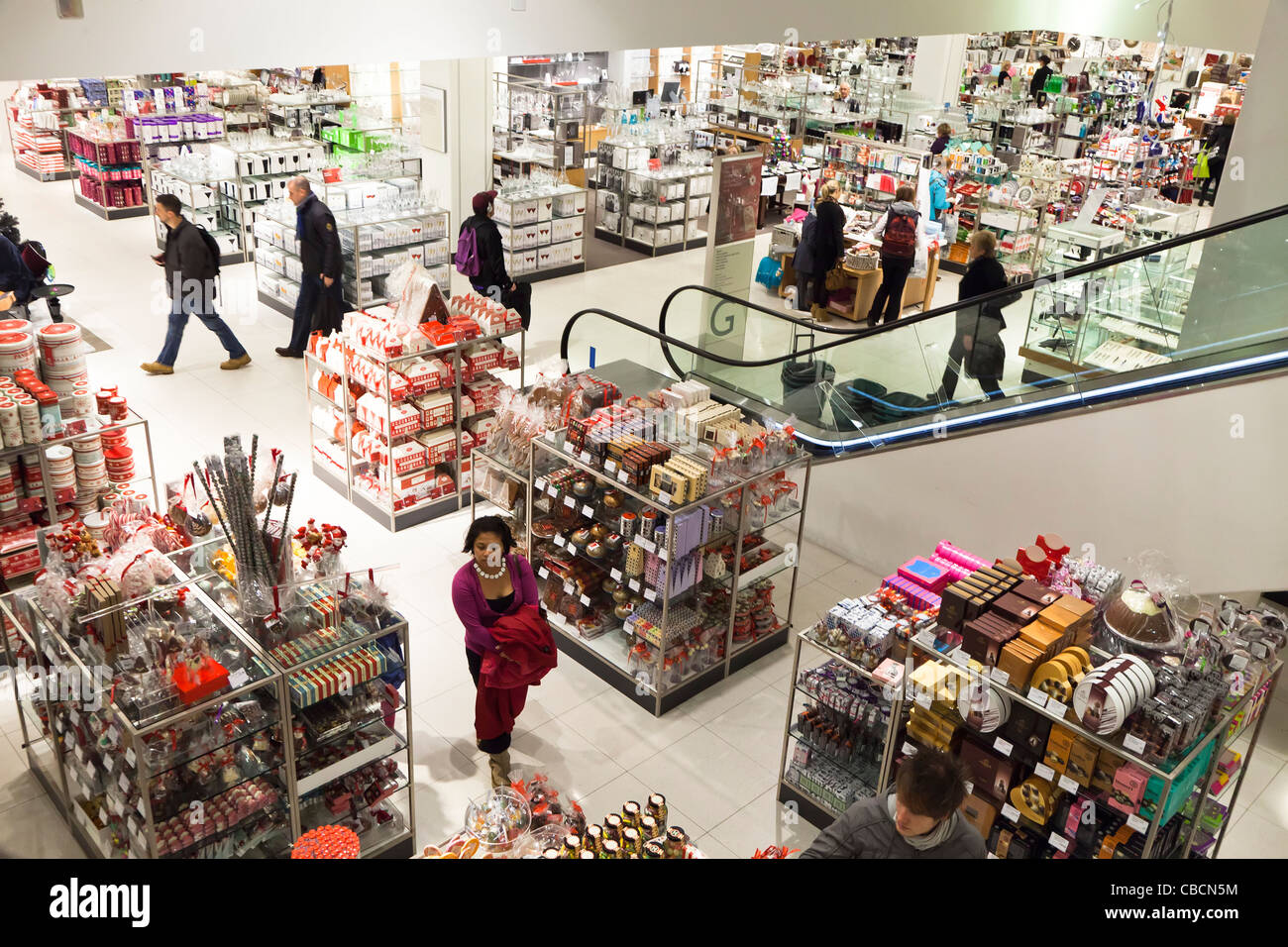 Shoppers inside modern store in hi-res stock photography and images - Alamy