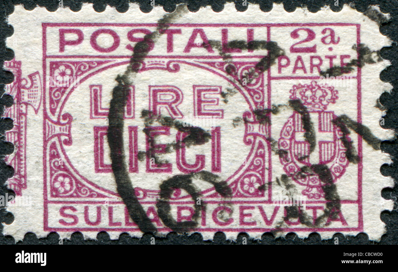 ITALY - CIRCA 1932: A stamp printed in Italy, shows the Coat of Arms ...