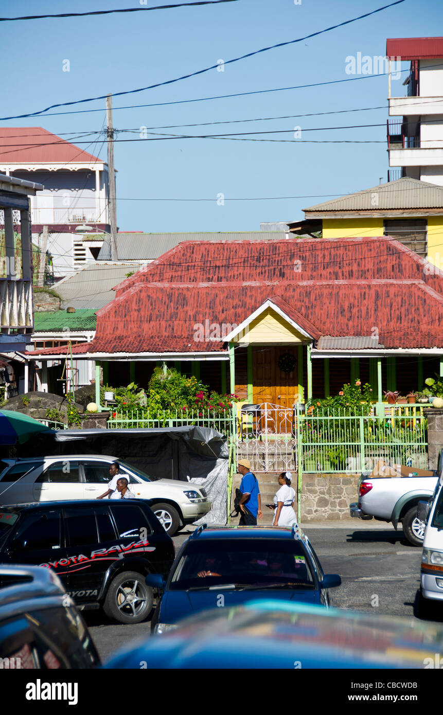 Roseau Dominica street traffic and colonial French Style architecture ...
