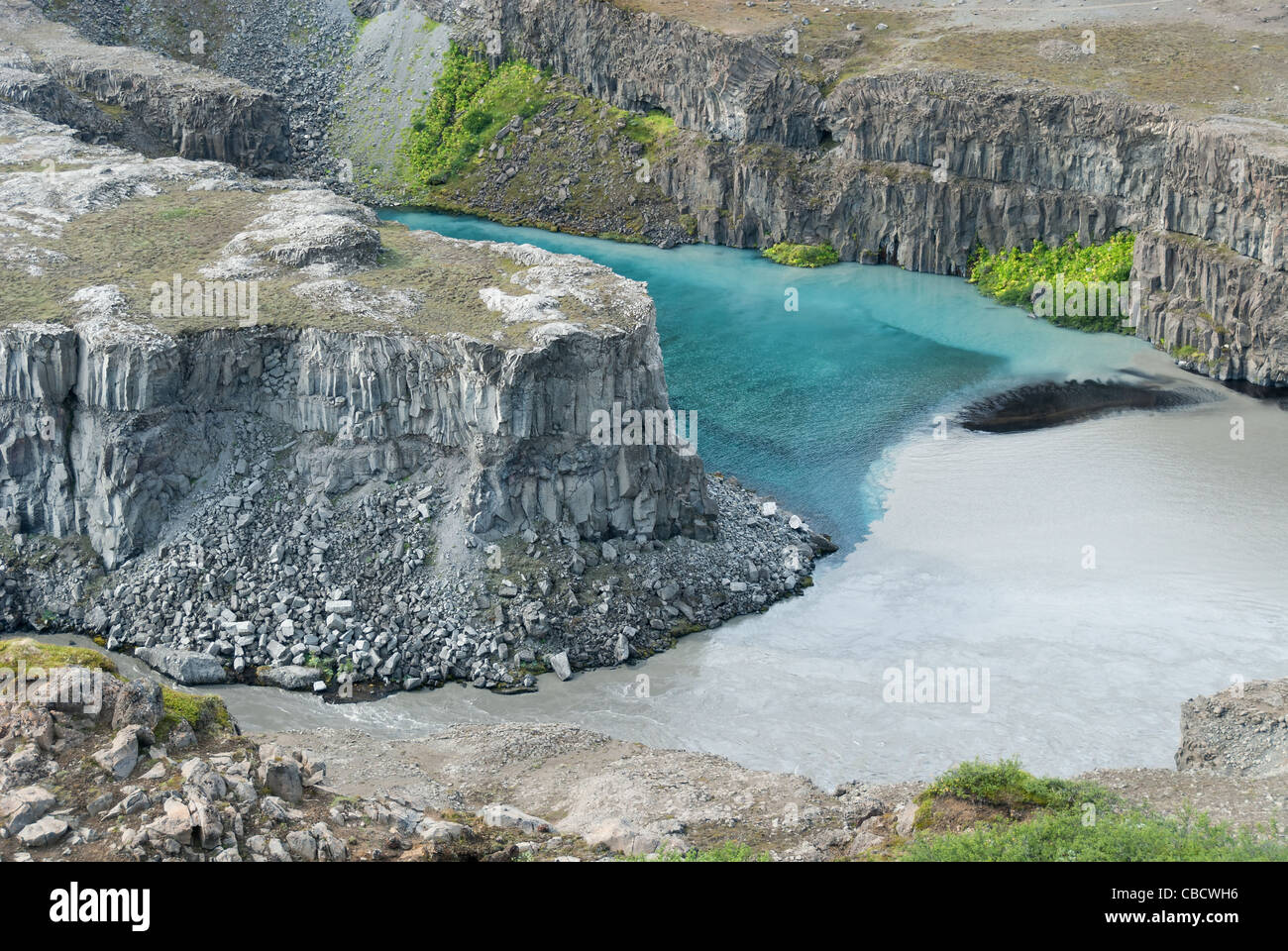 meeting of two rivers, a clear and a muddy Stock Photo - Alamy