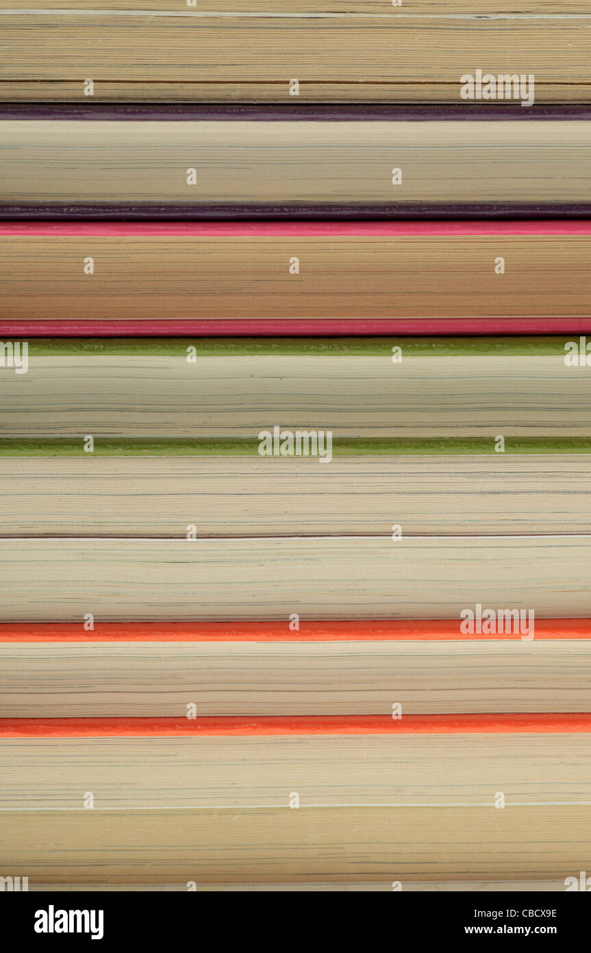 Pile of colour old books background Stock Photo - Alamy