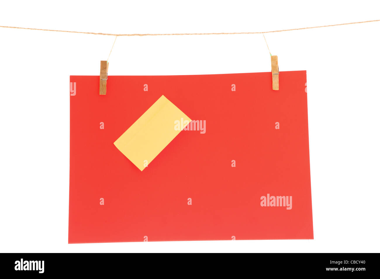 red blank paper sheet on a clothes line. Isolated on white background ...