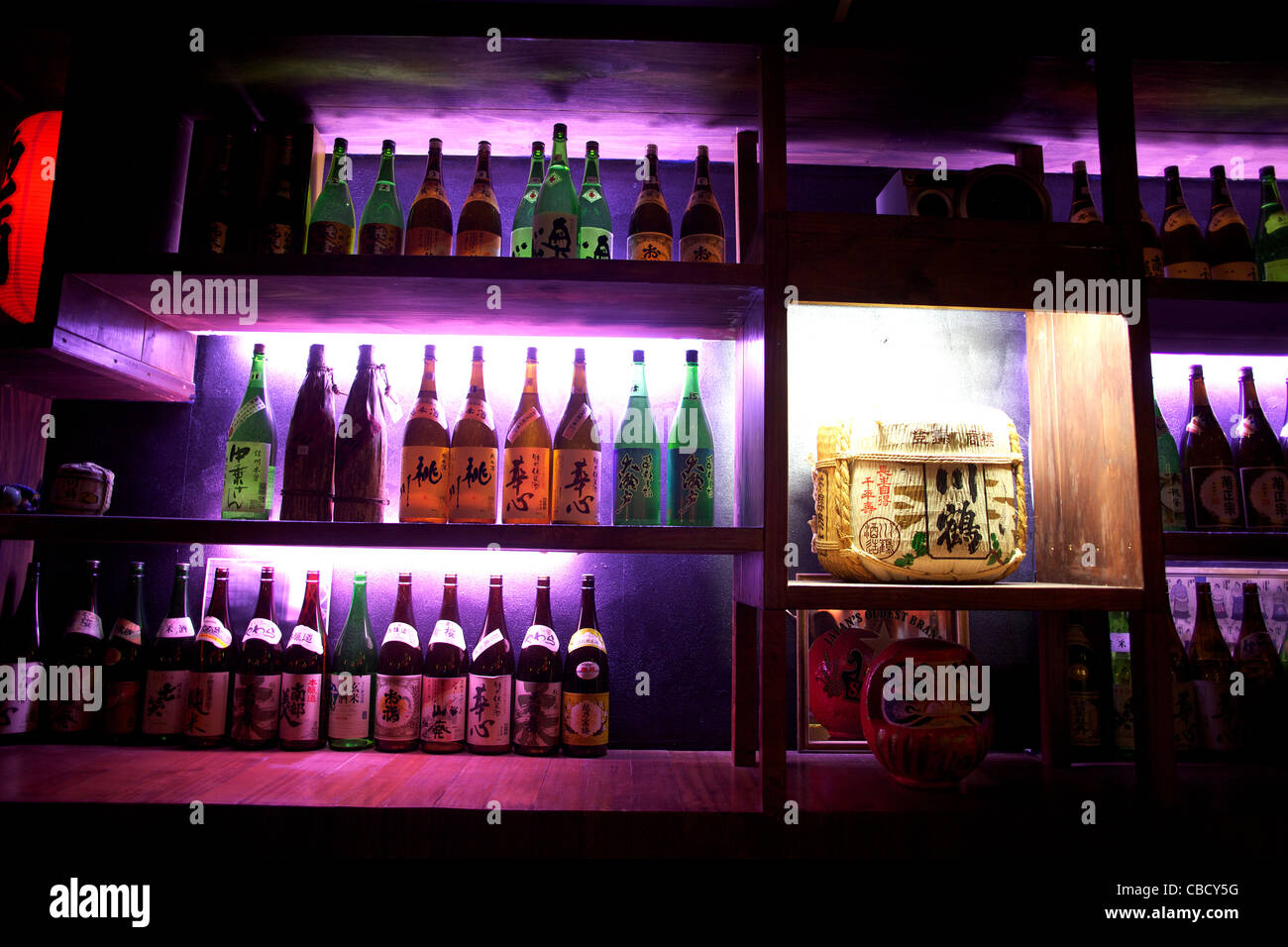 Bottles of Sake displayed in Tanuki's Cave a popular Japanese ...