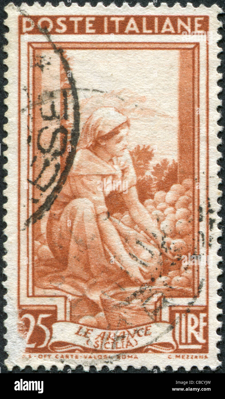 ITALY - CIRCA 1950: A stamp printed in Italy, is shown Sorting oranges ...