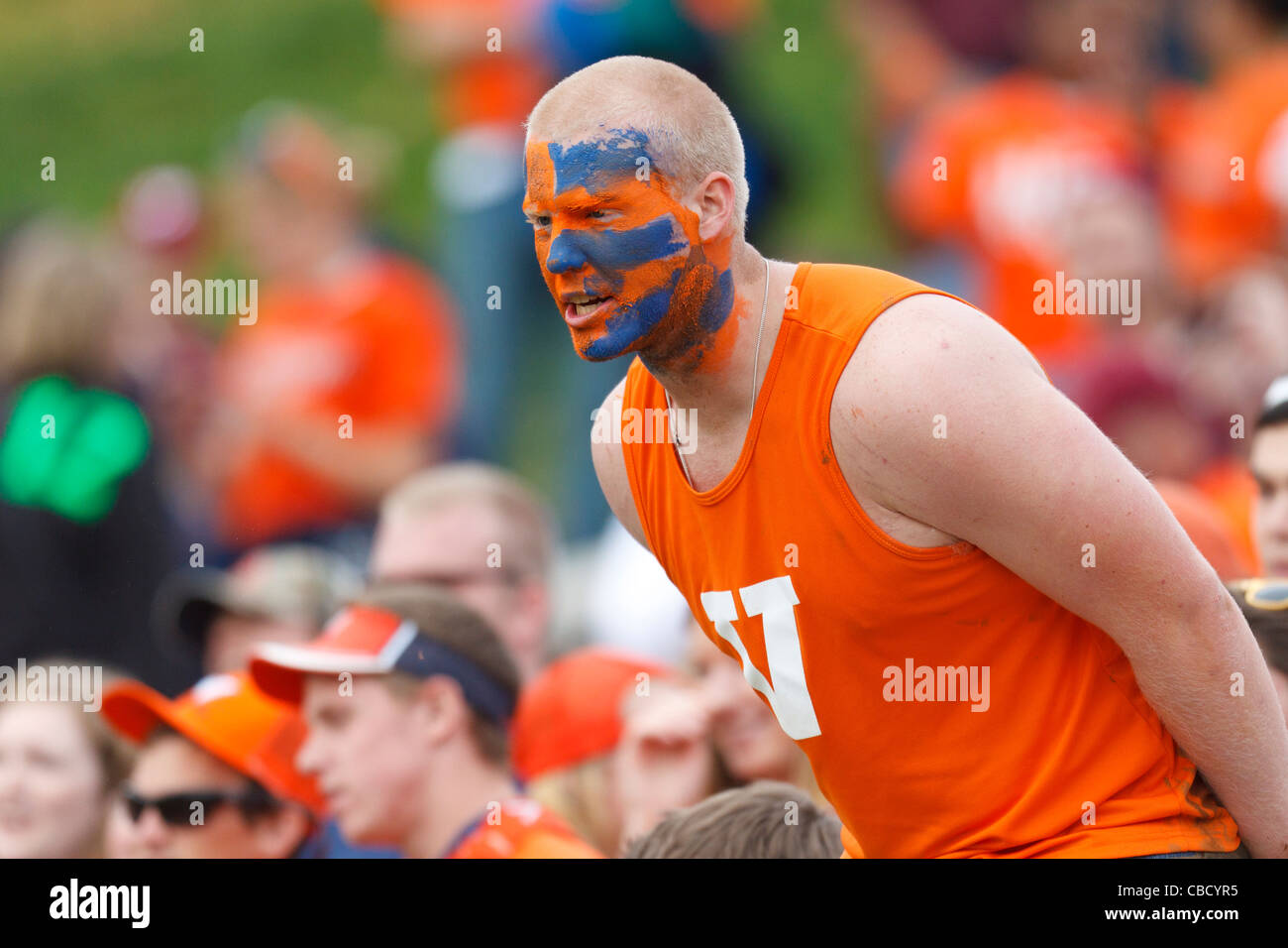 A male Virginia Cavaliers fan in the stands with face paint before the ...
