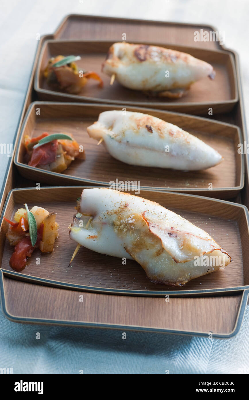 Calamari stuffed with herbs Stock Photo - Alamy
