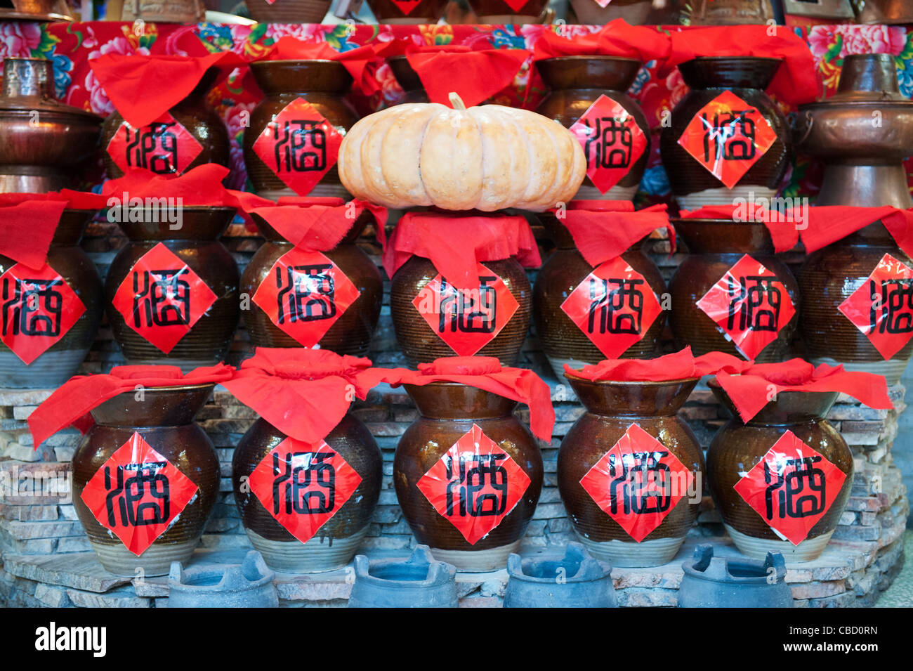 China traditional wine jars in the yard Stock Photo - Alamy