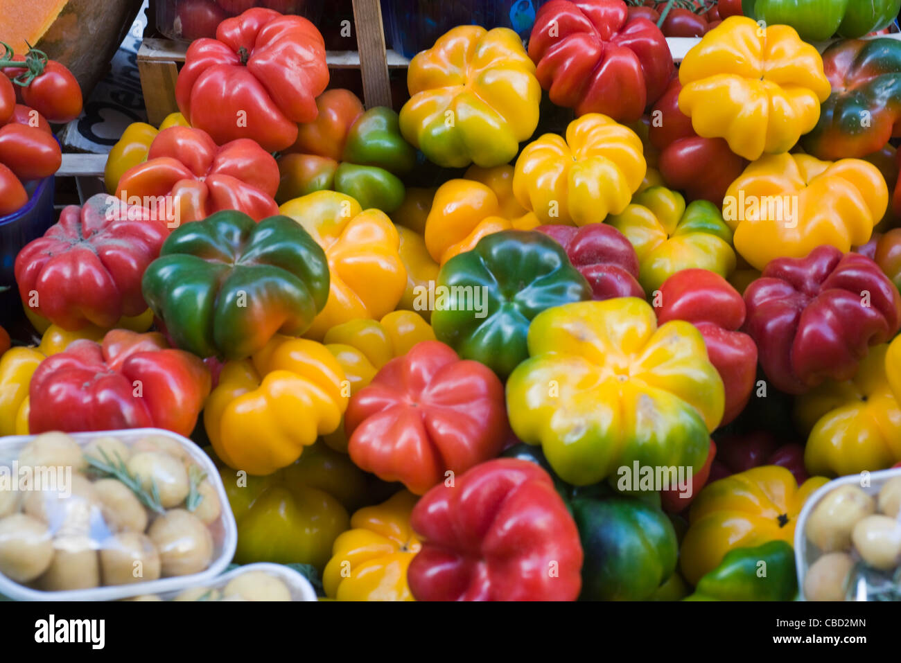 Assorted fresh bell peppers in market Stock Photo - Alamy