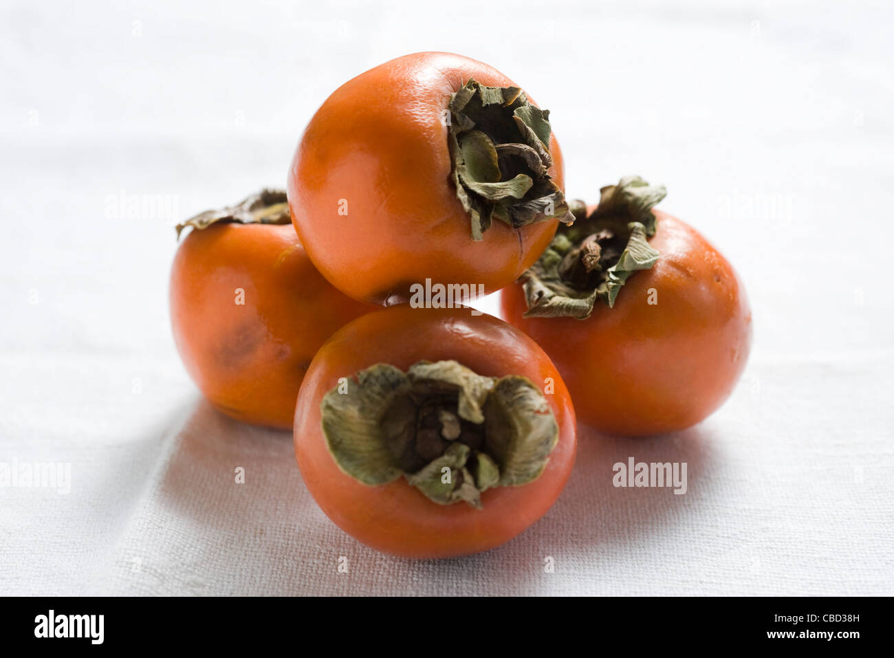 4 persimmons hi-res stock photography and images - Alamy
