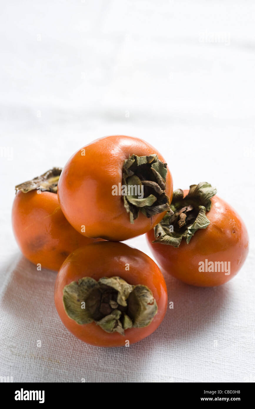 4 persimmons hi-res stock photography and images - Alamy