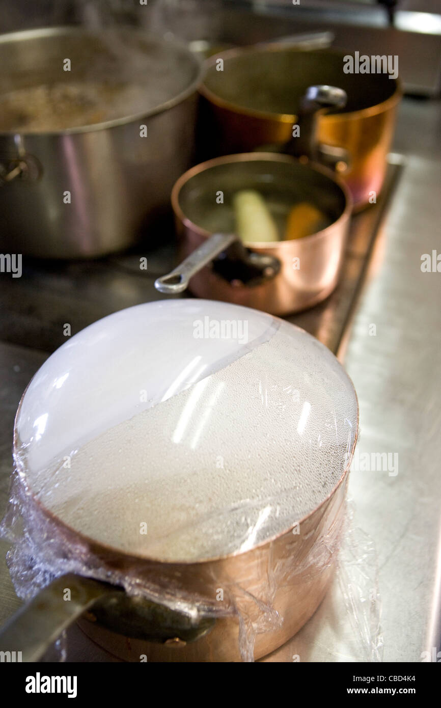 Pot wrapped with plastic wrap Stock Photo - Alamy