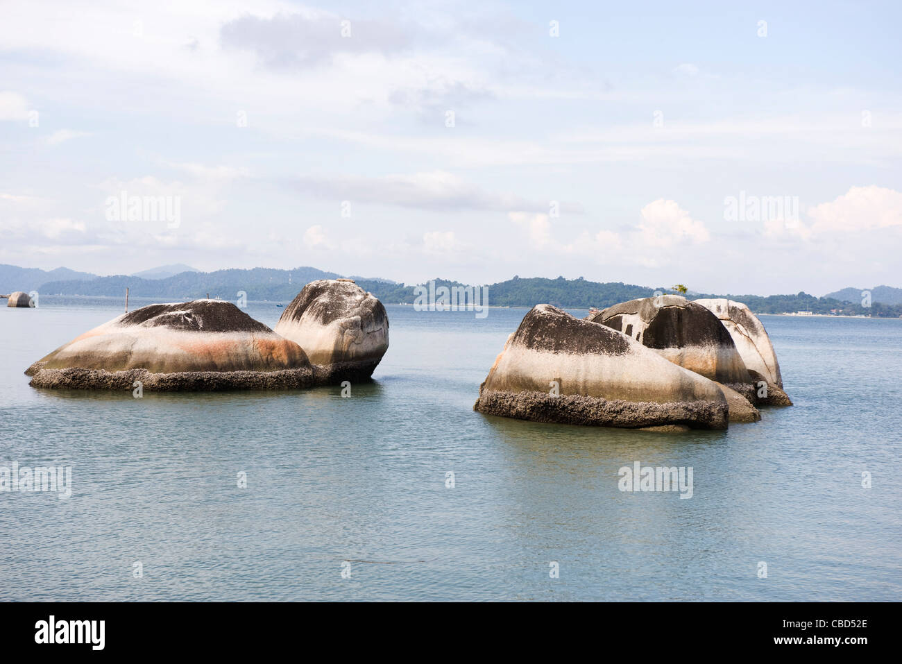 Rock formation in water Stock Photo - Alamy