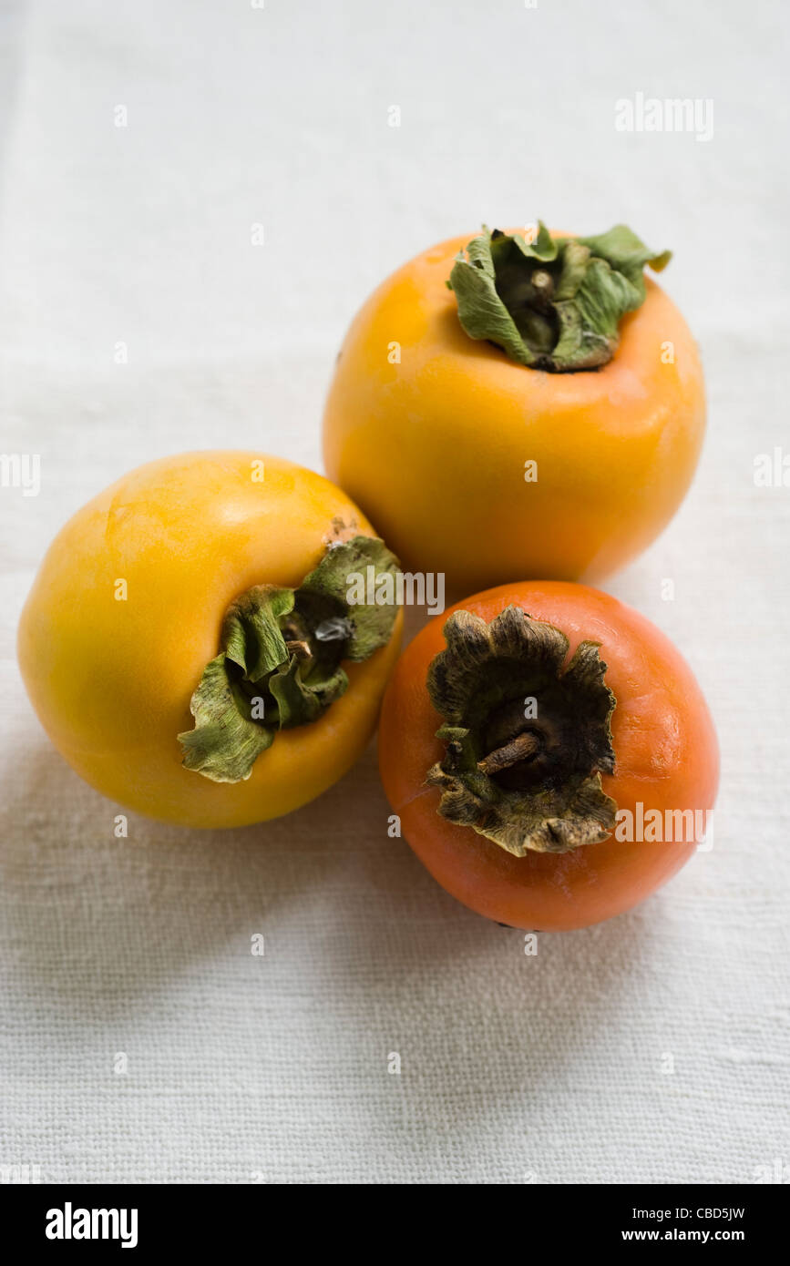 Fresh persimmons hi-res stock photography and images - Alamy