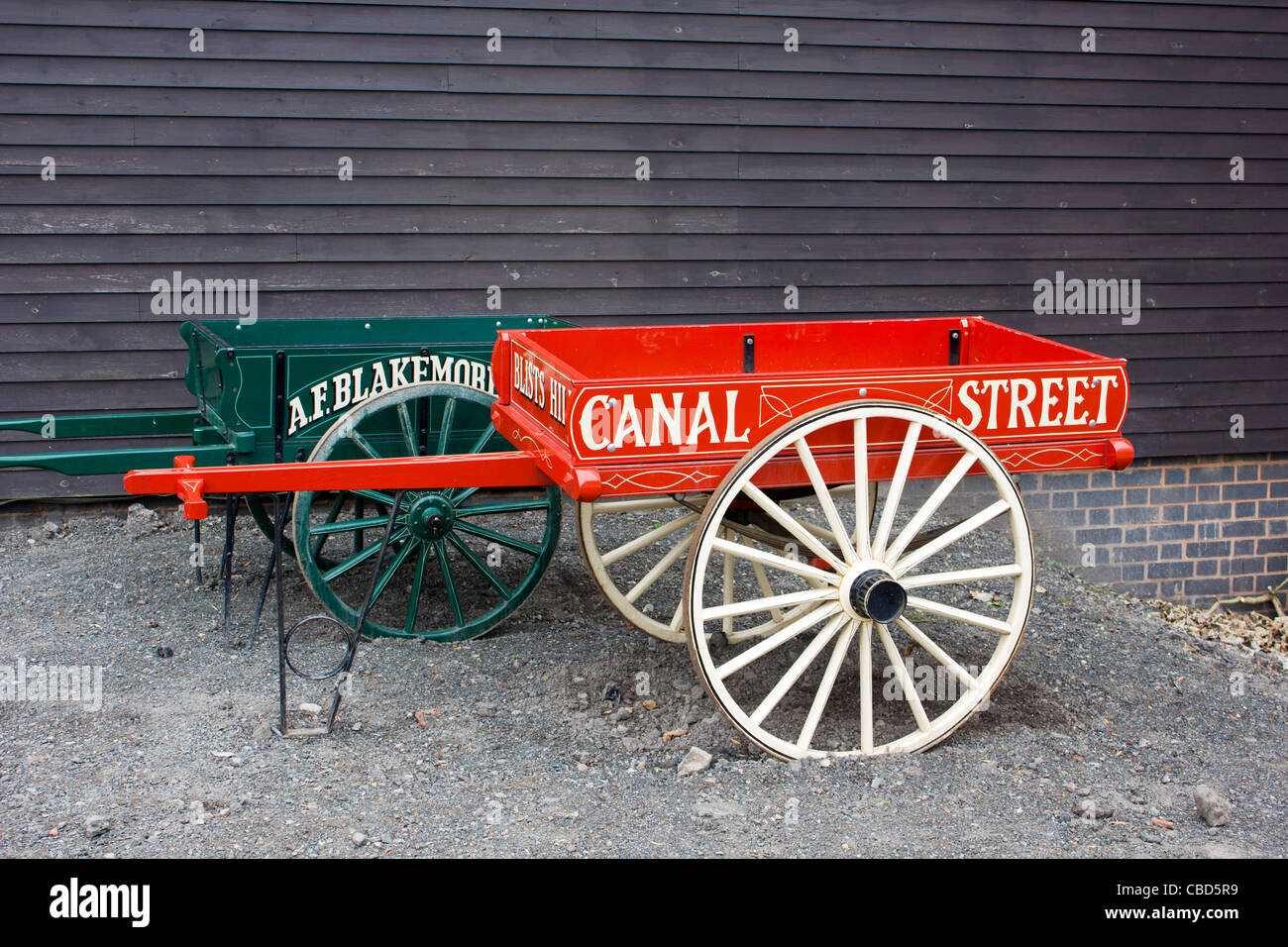Two antique carts on display in one of the Iron Bridge Museums, West ...