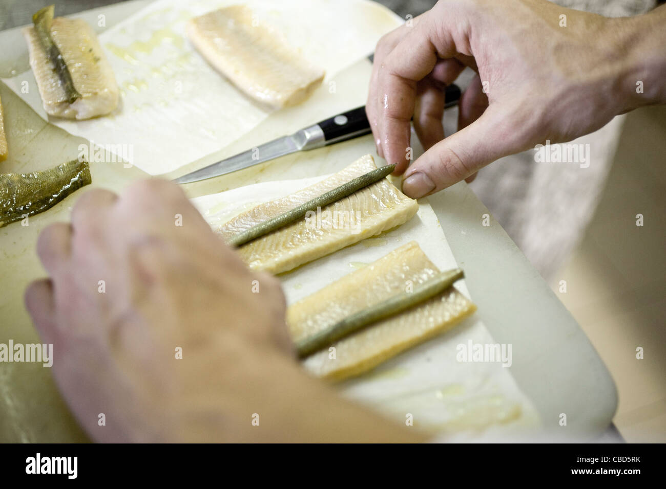 Chef preparing fish Stock Photo - Alamy