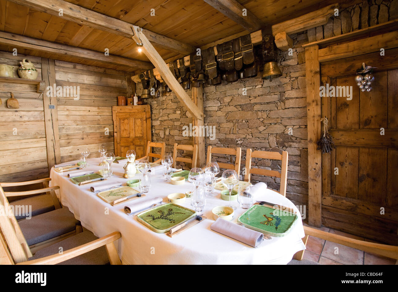 Dining room of rustic gourmet restaurant Stock Photo - Alamy