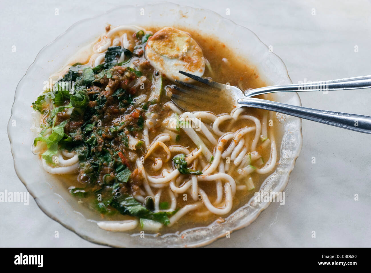 Asam laksa, Malaysian noodle soup Stock Photo - Alamy