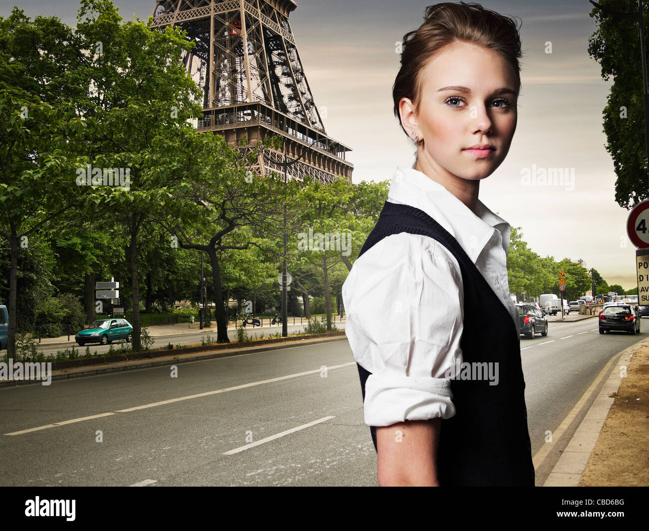 Woman walking on city street Stock Photo - Alamy