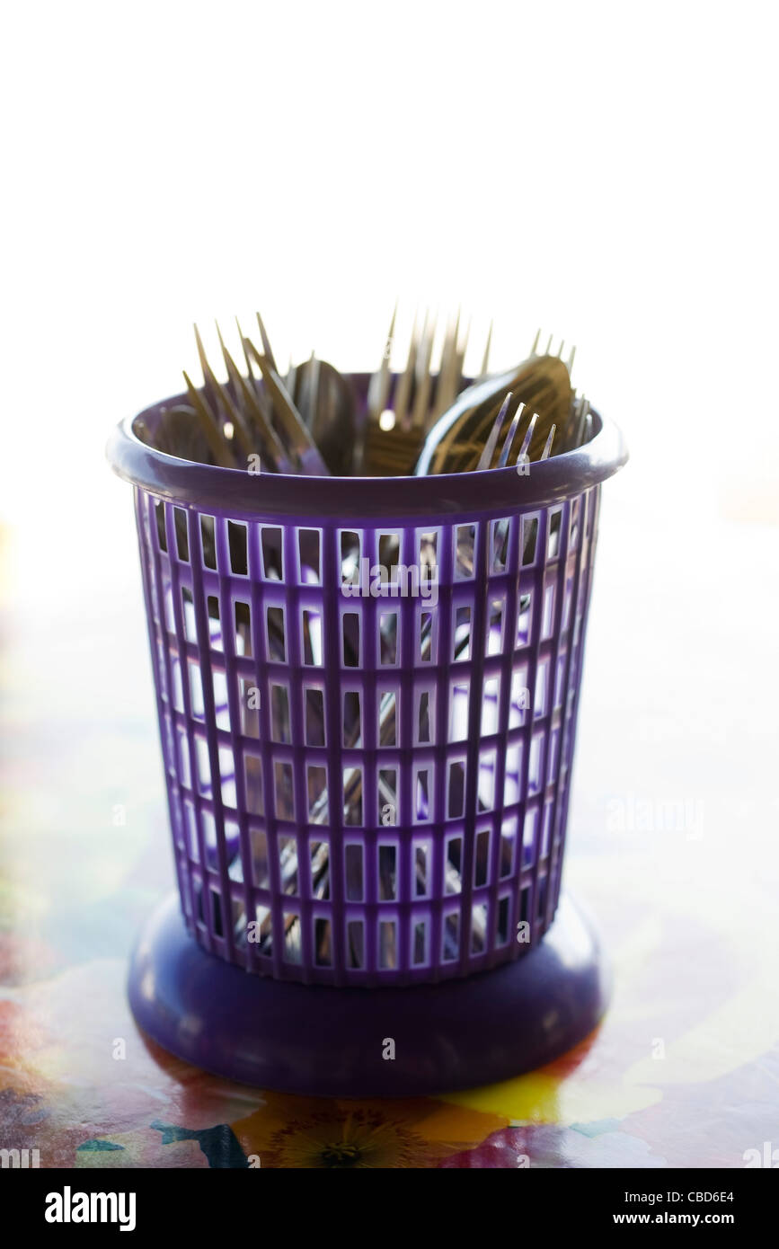 Forks and spoons in basket Stock Photo - Alamy