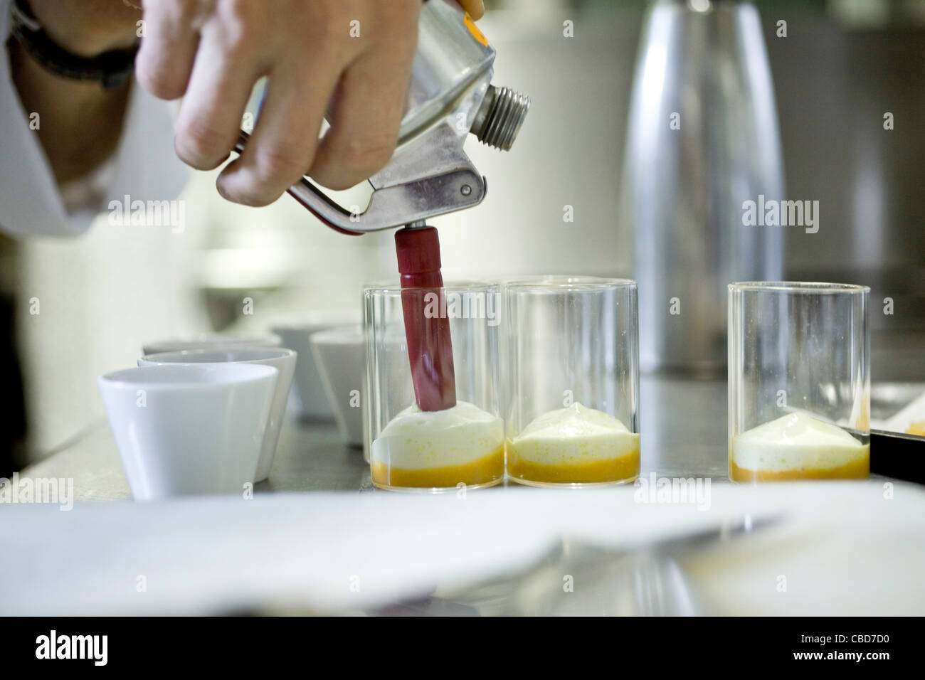 Chef preparing appetizers commercial kitchen hi-res stock photography ...