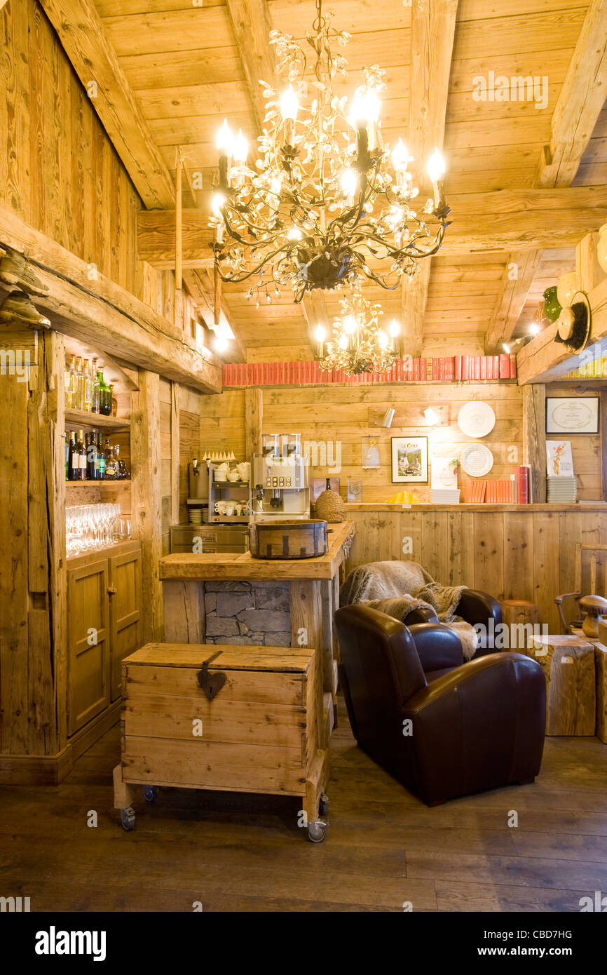 Interior of chalet, chandelier hanging on ceiling Stock Photo - Alamy