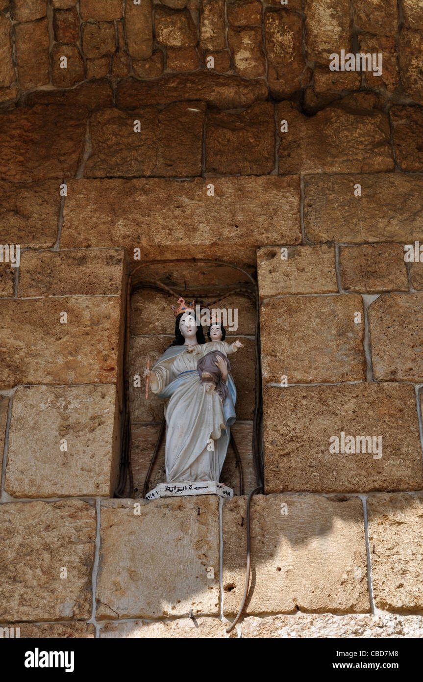 Black haired, brown-eyed Madonna statue with black haired infant Jesus ...