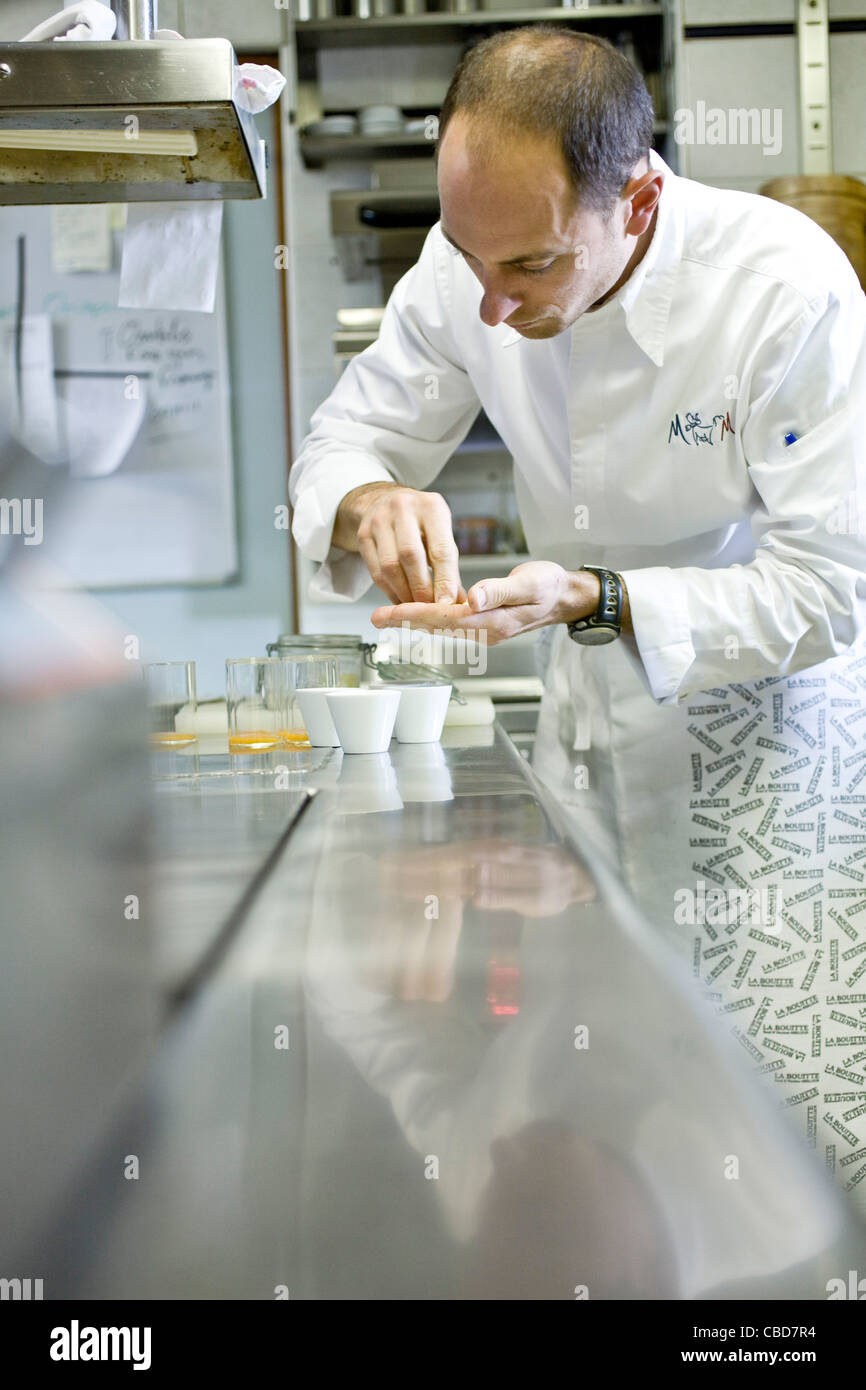 Chef preparing appetizers in kitchen Stock Photo - Alamy