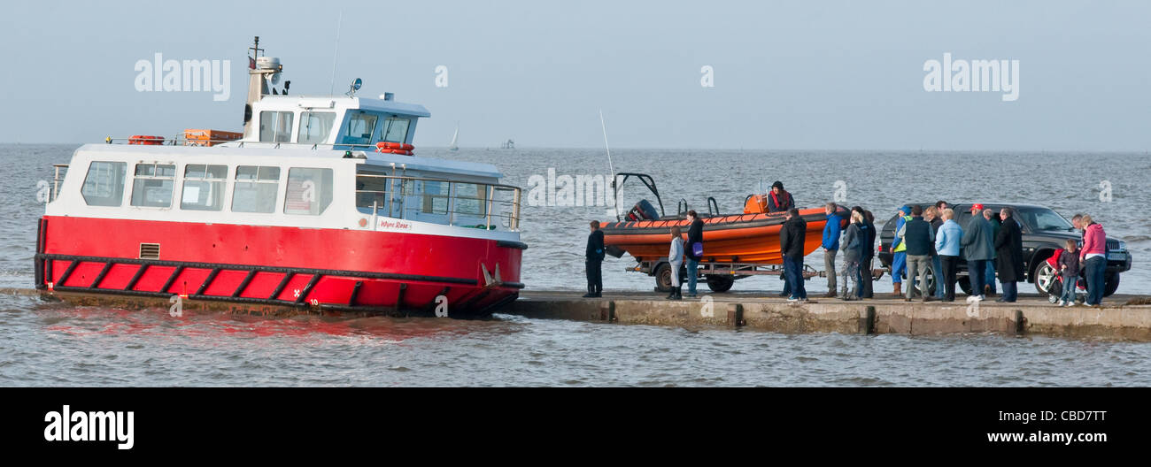 Passengers wait to board the ferry from Knott End to Fleetwood across ...
