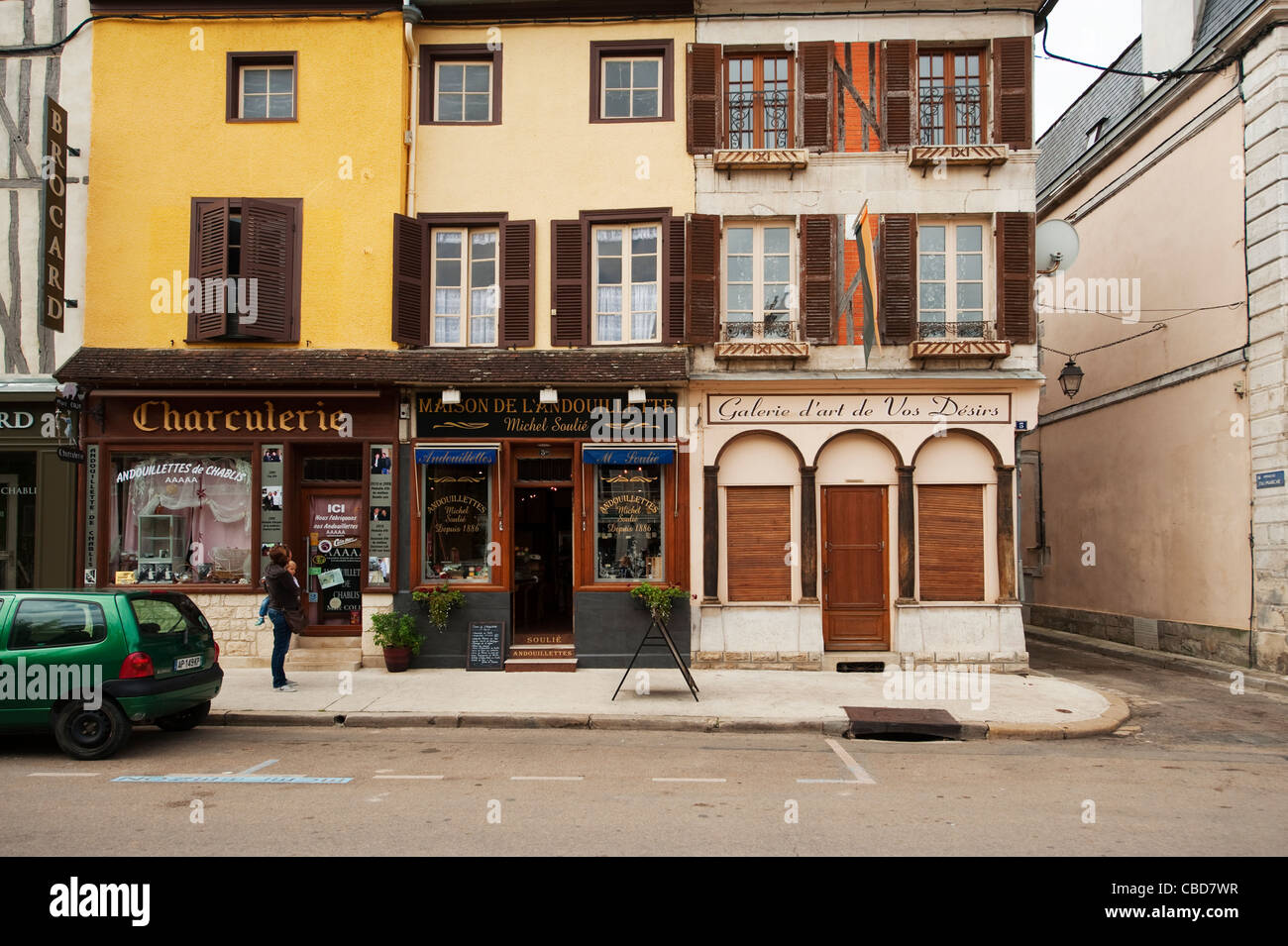 Traditional shop fronts in the centre of Chablis in Burgundy, France ...