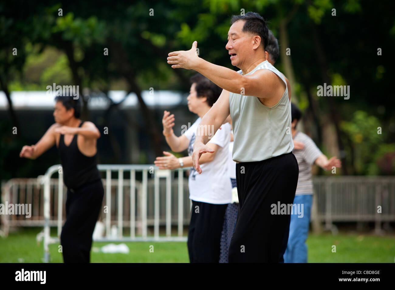 Public early morning Thai Chi exercise group Stock Photo - Alamy