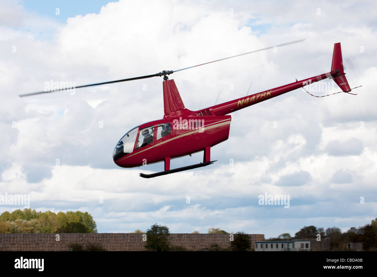 Robinson R44 Turbine N4478K in flight at Breighton airfield Stock Photo ...