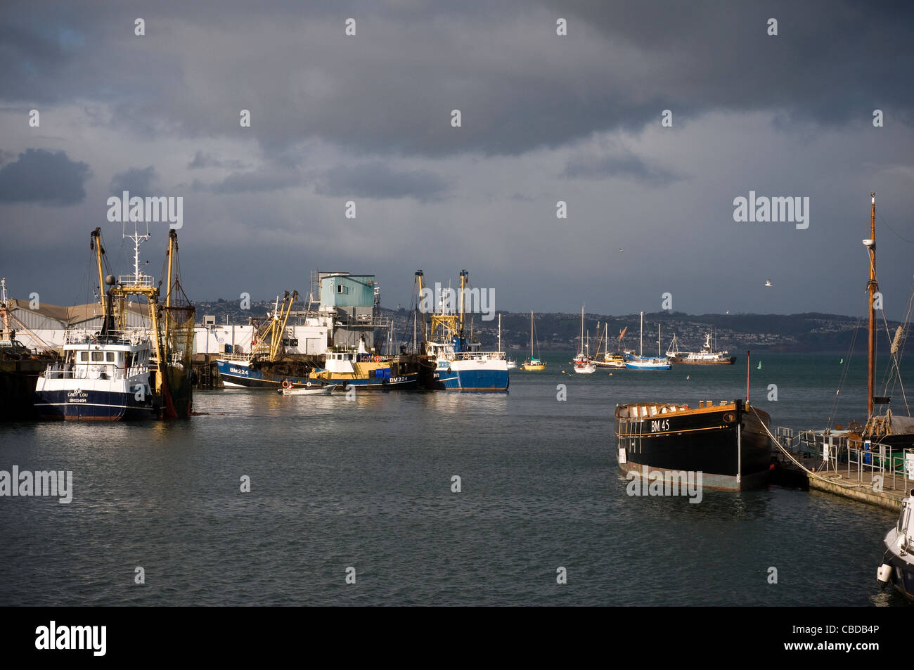 Brixham Harbour with fish market in background, boat, brixham fish ...