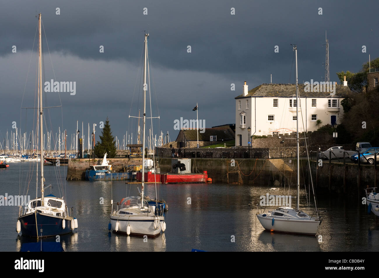 Brixham Harbour with Custom house in background, boat, brixham fish ...