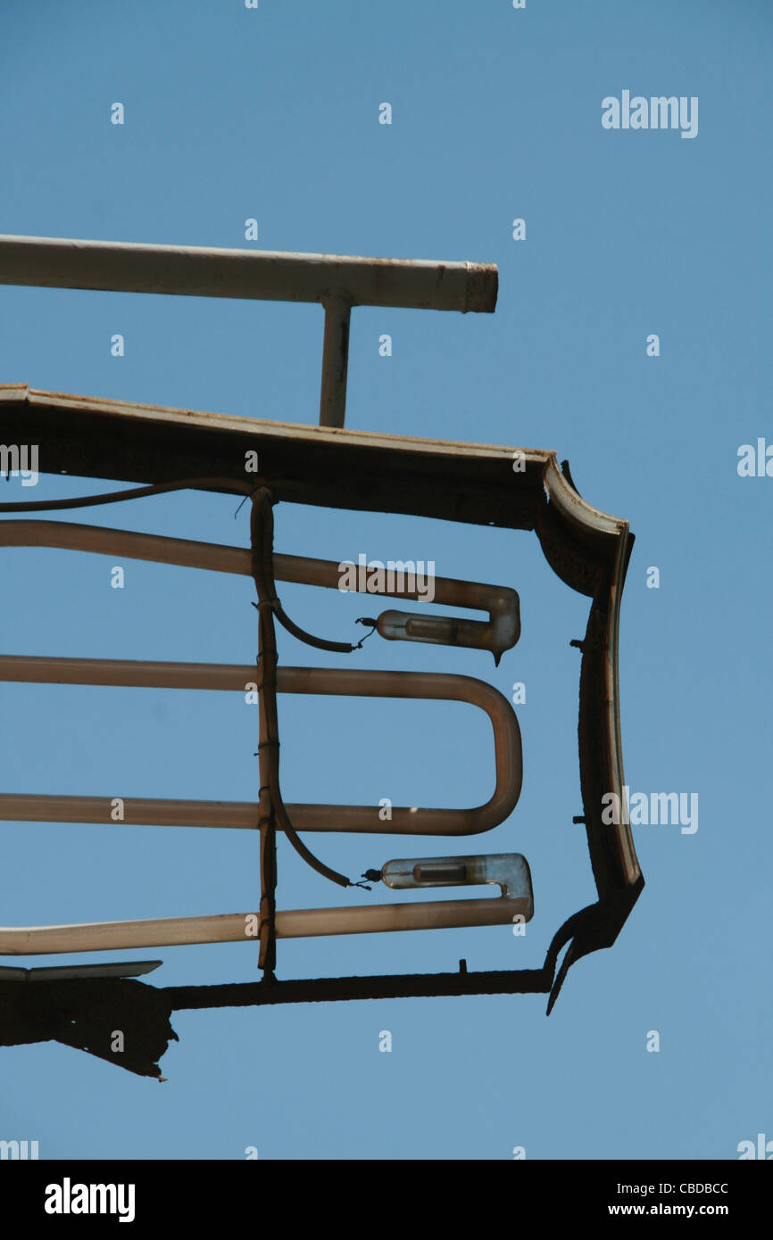 old damaged neon sign outside shop front in city town Stock Photo - Alamy