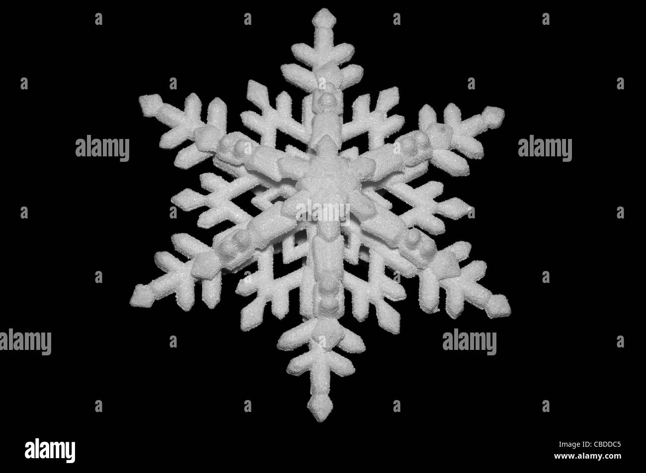 Snowflake isolated on black Stock Photo - Alamy