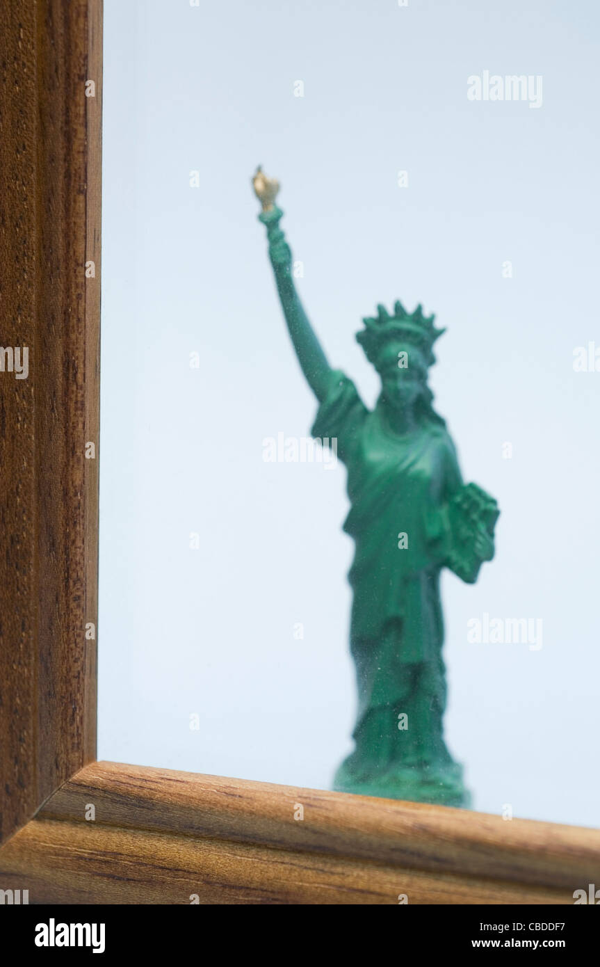 Statue of Liberty behind window glass Stock Photo - Alamy