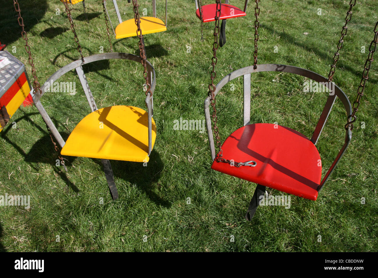 Children on fair ground swing ride hi-res stock photography and images ...