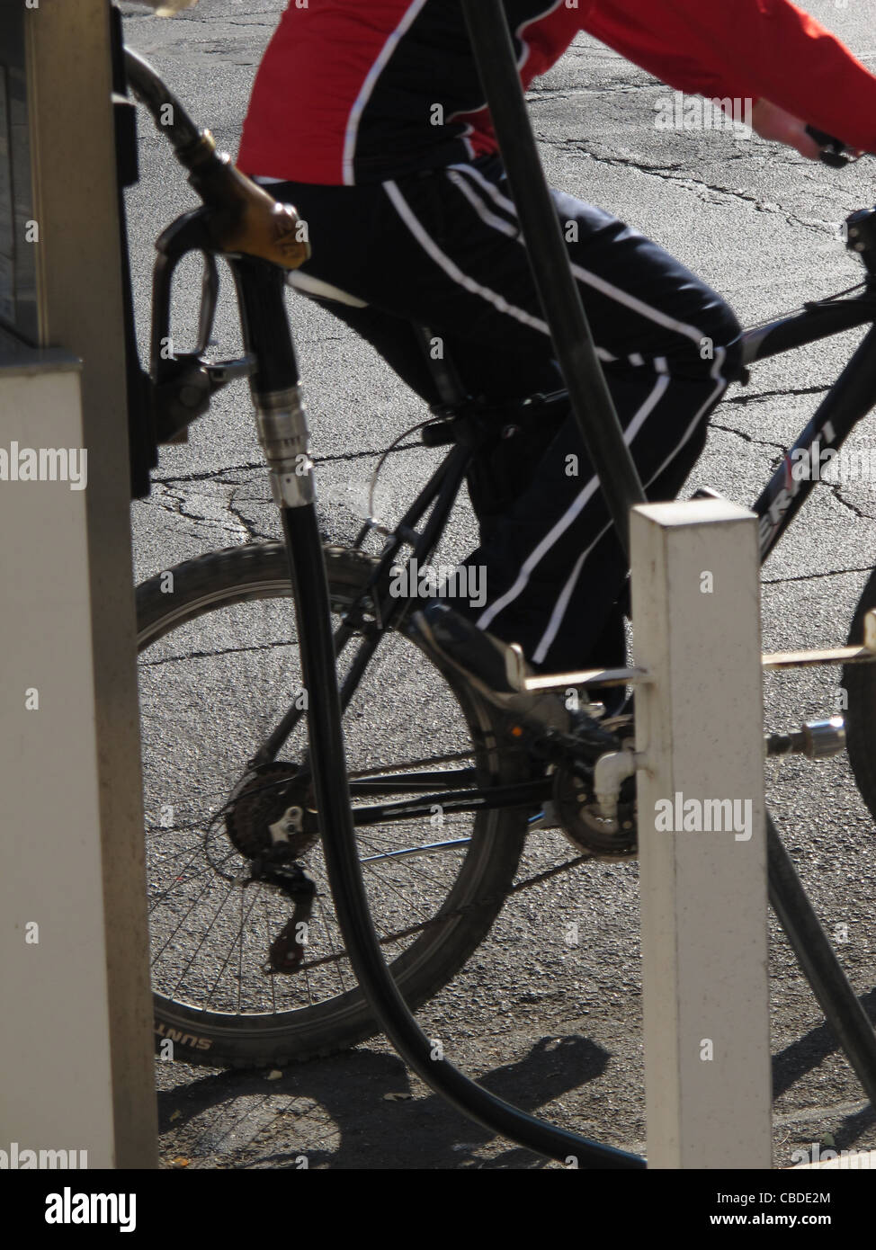Person riding bike past hi-res stock photography and images - Alamy