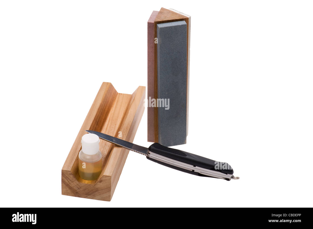 object on white - Sharpener stone and knife Stock Photo - Alamy