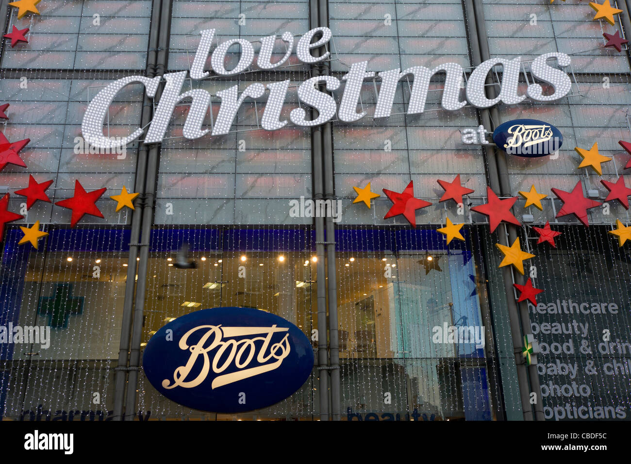The words 'Love Christmas at Boots' are spread across the frontage ...