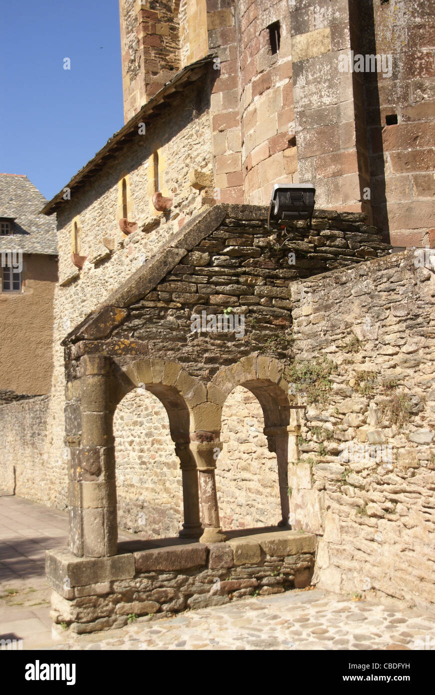 Romanesque tower and walls of the Abbey Church of St. Foy, Conques ...