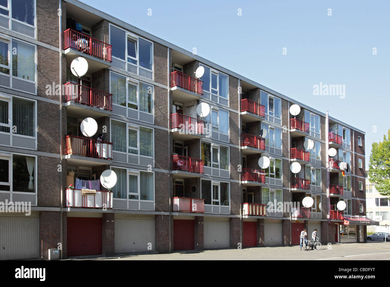 Satellite dishes on an apartment building in Holland Stock Photo - Alamy